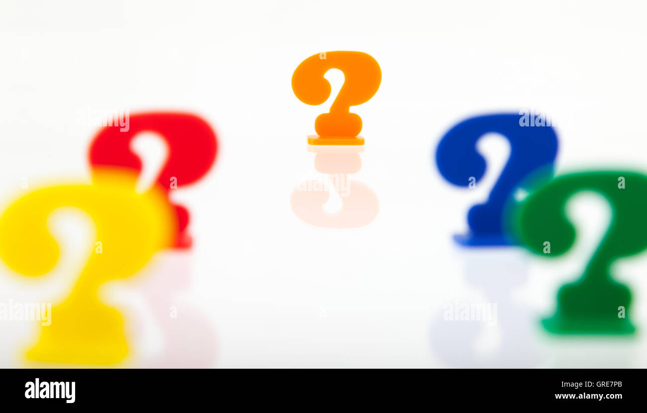 Different colored unique pawns isolated Stock Photo - Alamy