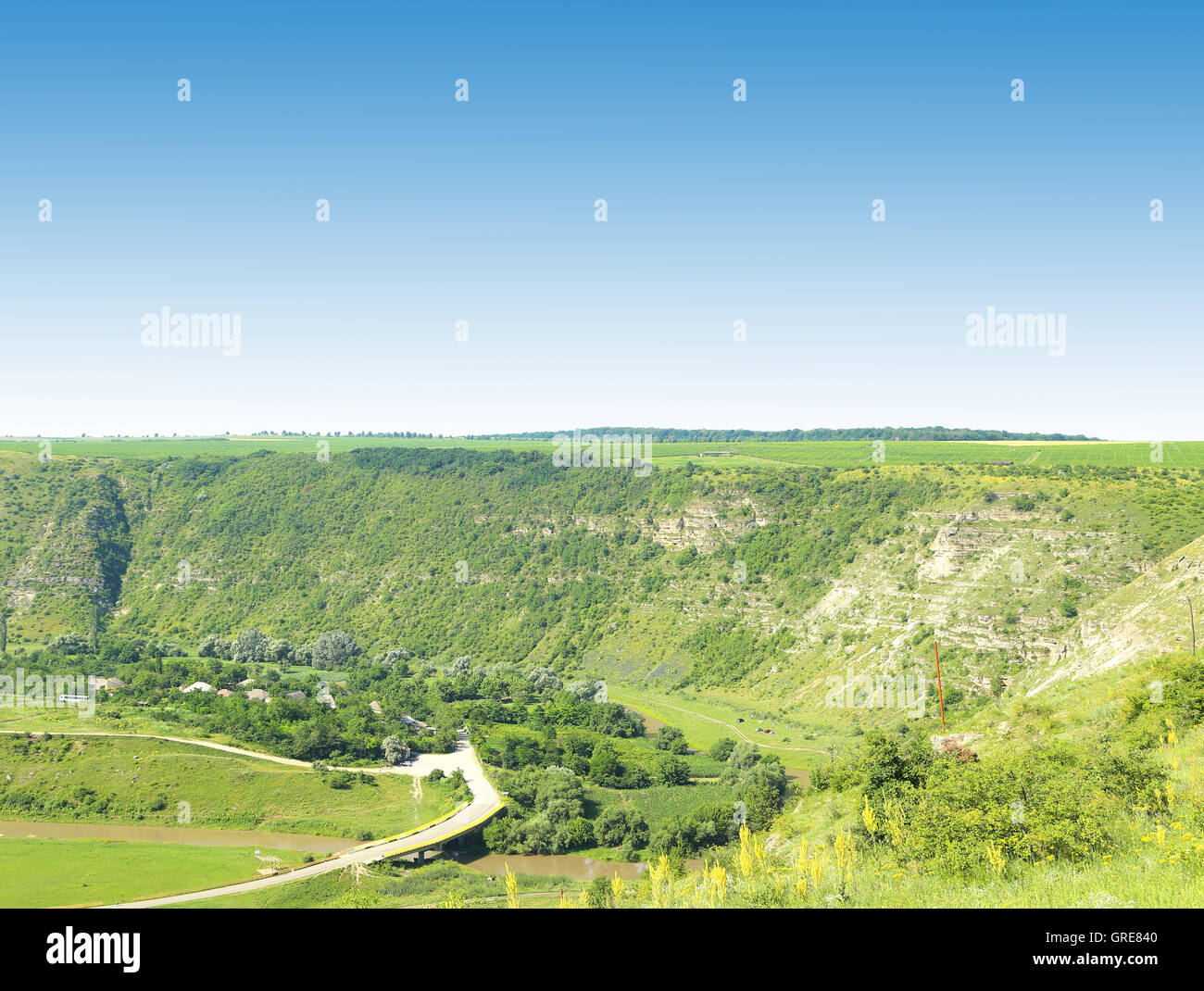 River channel extending along a steep bank Stock Photo - Alamy