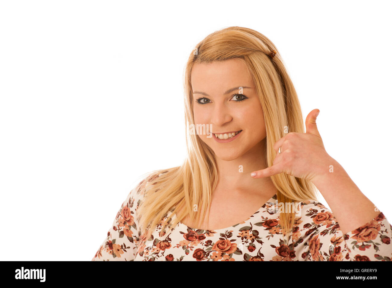 Woman gesturing call me isolated over white background Stock Photo - Alamy