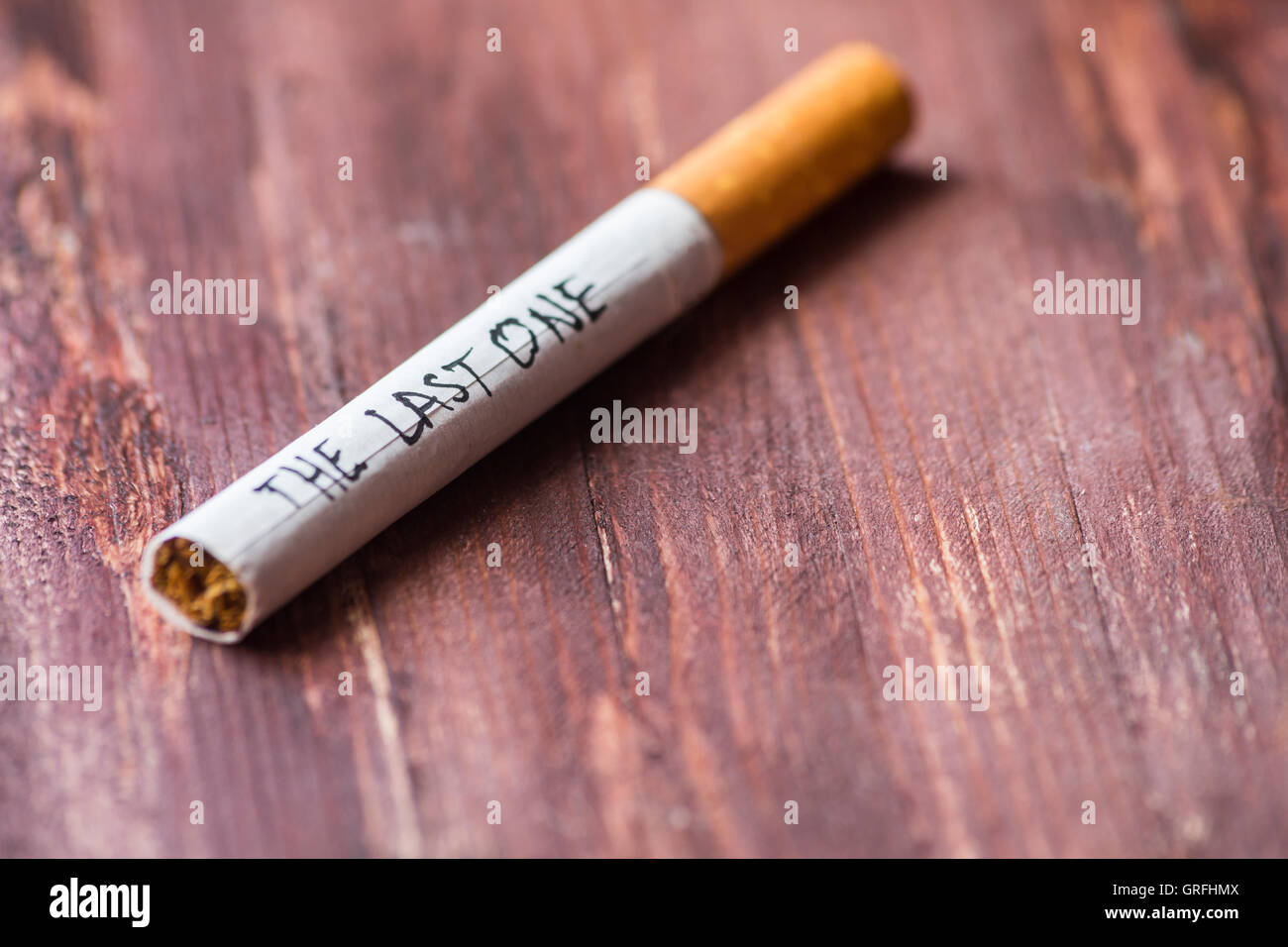 The last cigarette - quit smoking message Stock Photo - Alamy