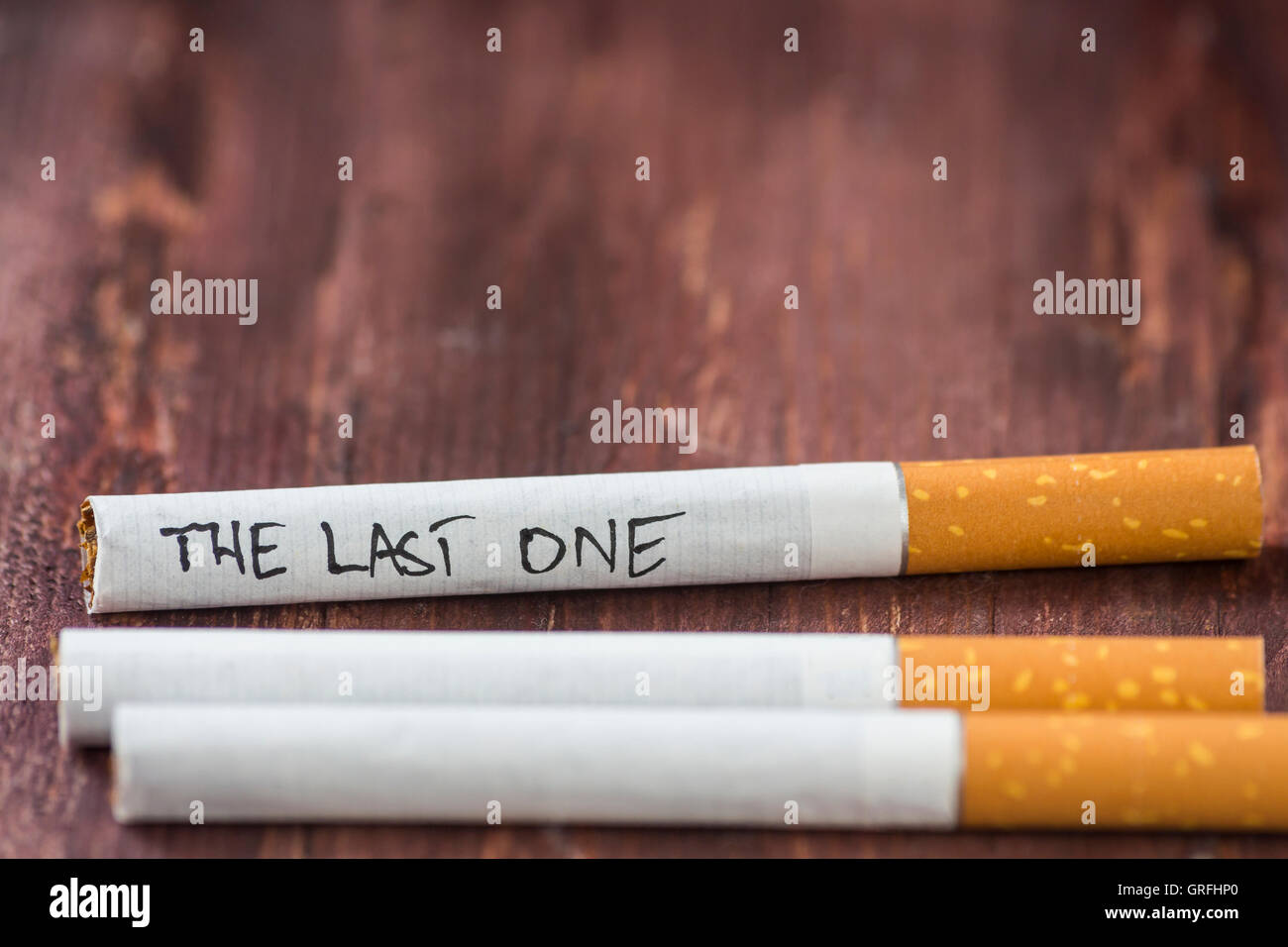 The last cigarette - quit smoking message Stock Photo - Alamy