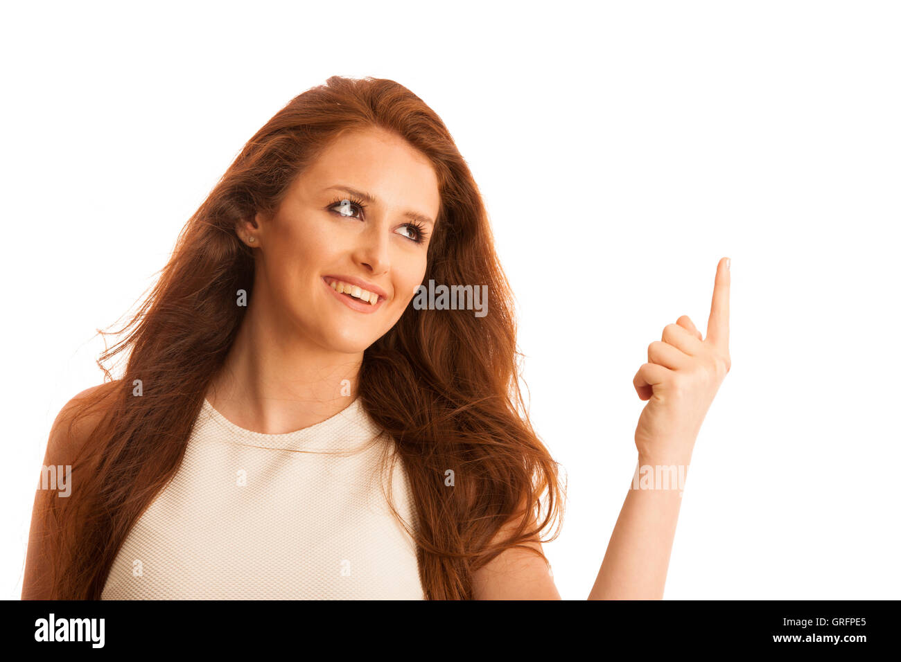 Business woman pointing to copy space while presenting a product in ...