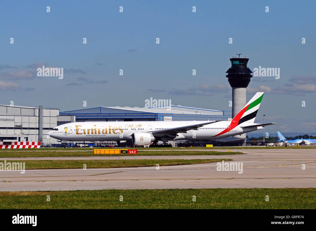 Emirates Boeing 777-300 at Manchester airport, Manchester, England, UK ...