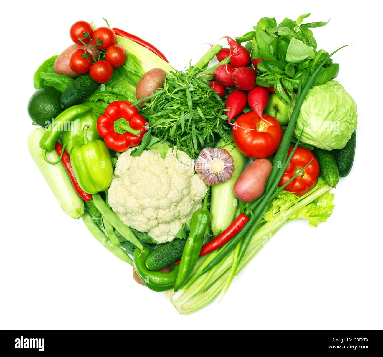 Love vegetables concept, pile of vegetables shaped as heart isolated on ...