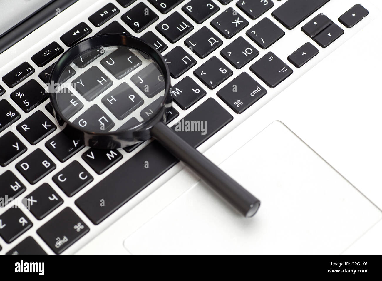 Laptop With Magnifying Glass.Close up Stock Photo - Alamy