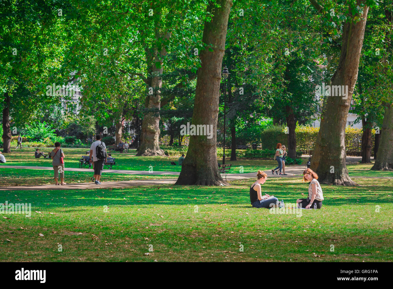 Russell Square London, view in summer of people relaxing in Russell ...