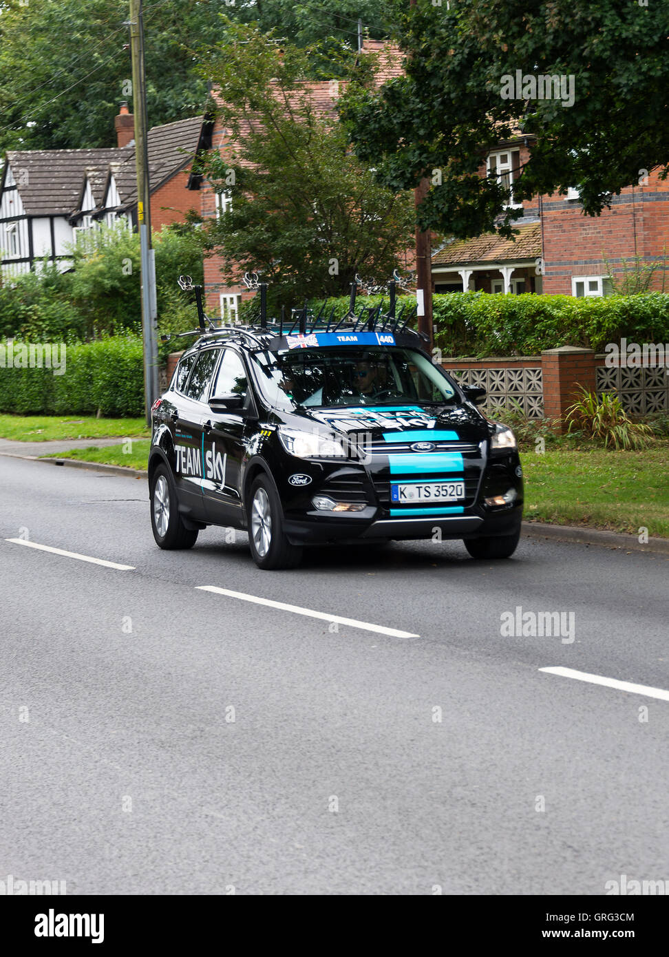 Team Support Cars Following the Tour of Britain Cycle Race Passing ...