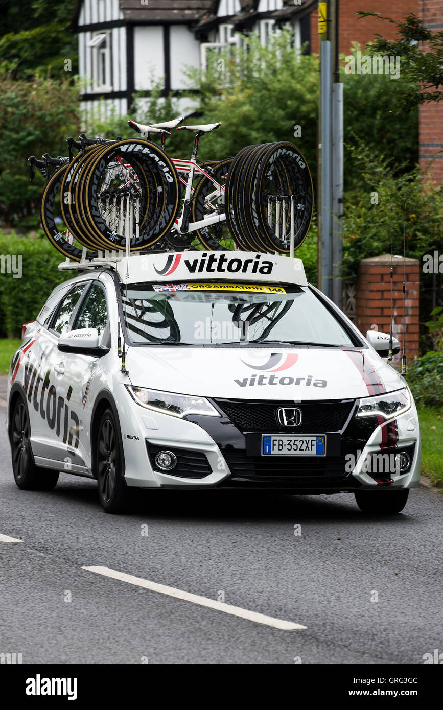 Team Support Cars Following the Tour of Britain Cycle Race Passing ...
