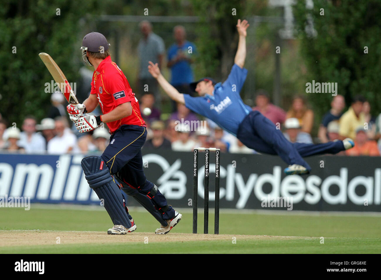 Tom Westley of Essex looks back as Alex Gidman makes a diving attempt ...