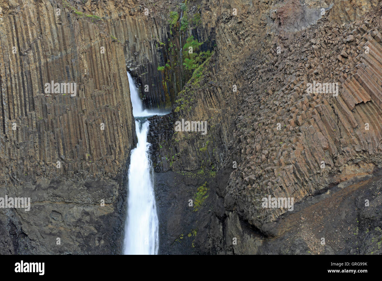 Close up view of part of Litlanesfoss waterfall showing the basalt ...