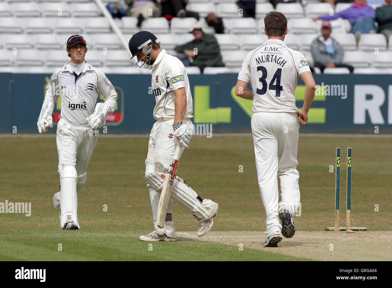 Jaik Mickleburgh of Essex is bowled out by Tim Murtagh of Middlesex ...