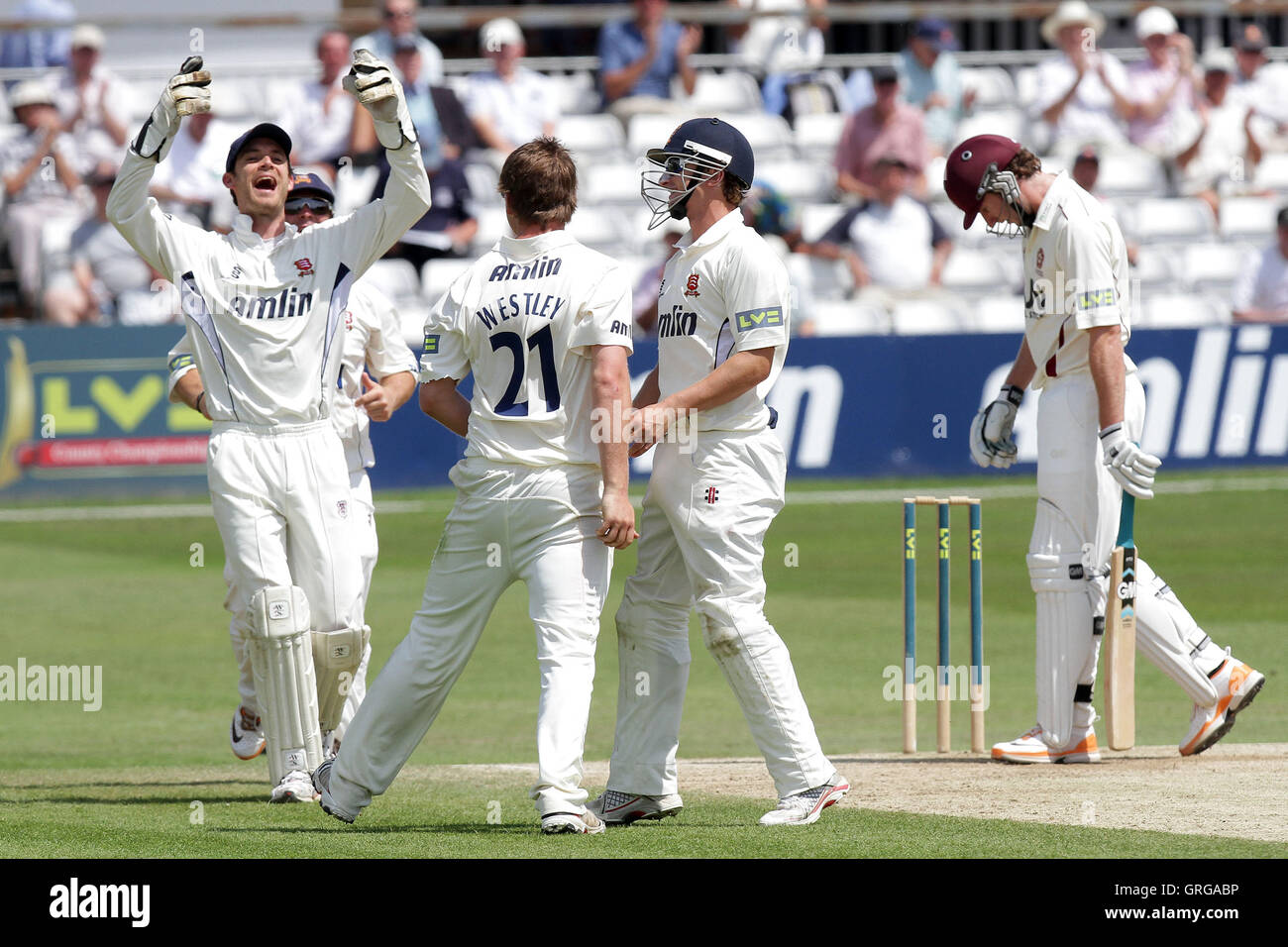 James Foster of Essex (L) celebrates the wicket of Alex Wakely (R ...