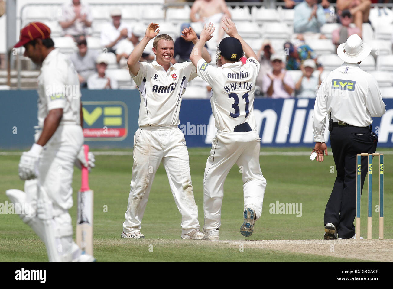 Tom Craddock of Essex celebrates the wicket of Chaminda Vaas with Adam ...