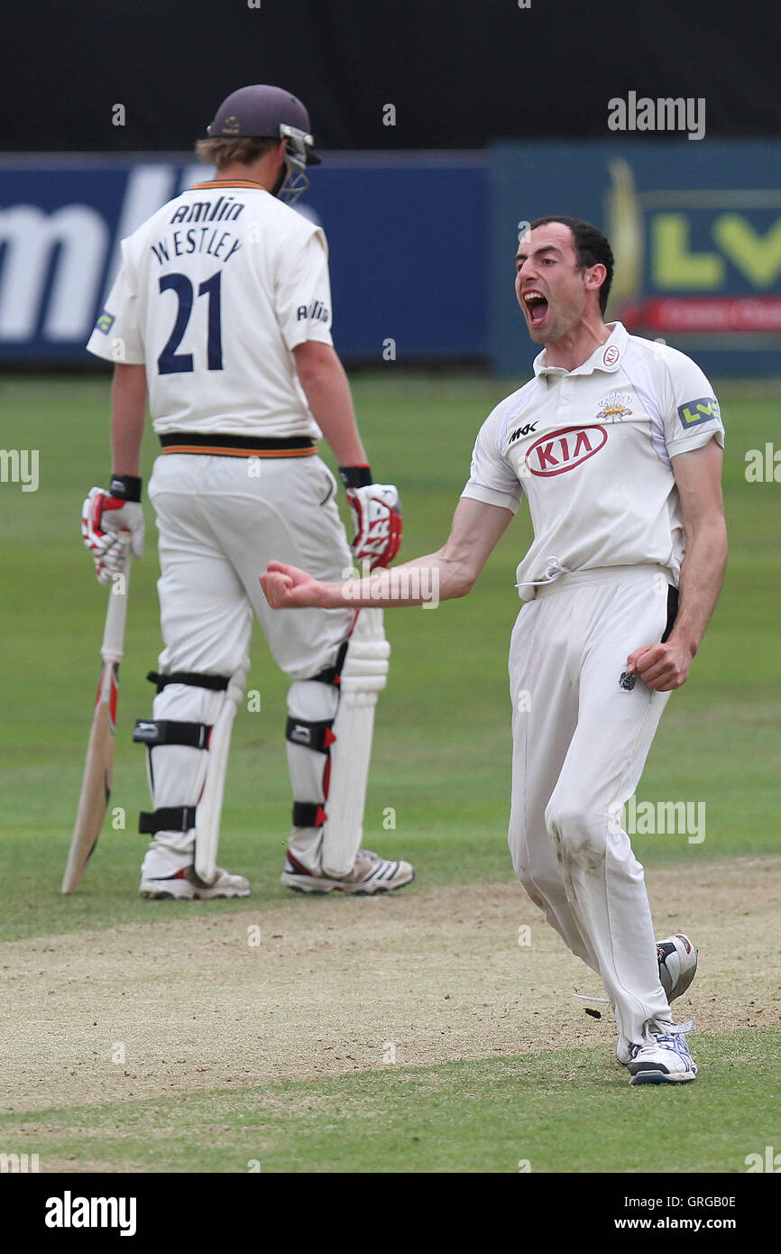 Tim Linley of Surrey claims the wicket of Jaik Mickleburgh - Essex CCC ...