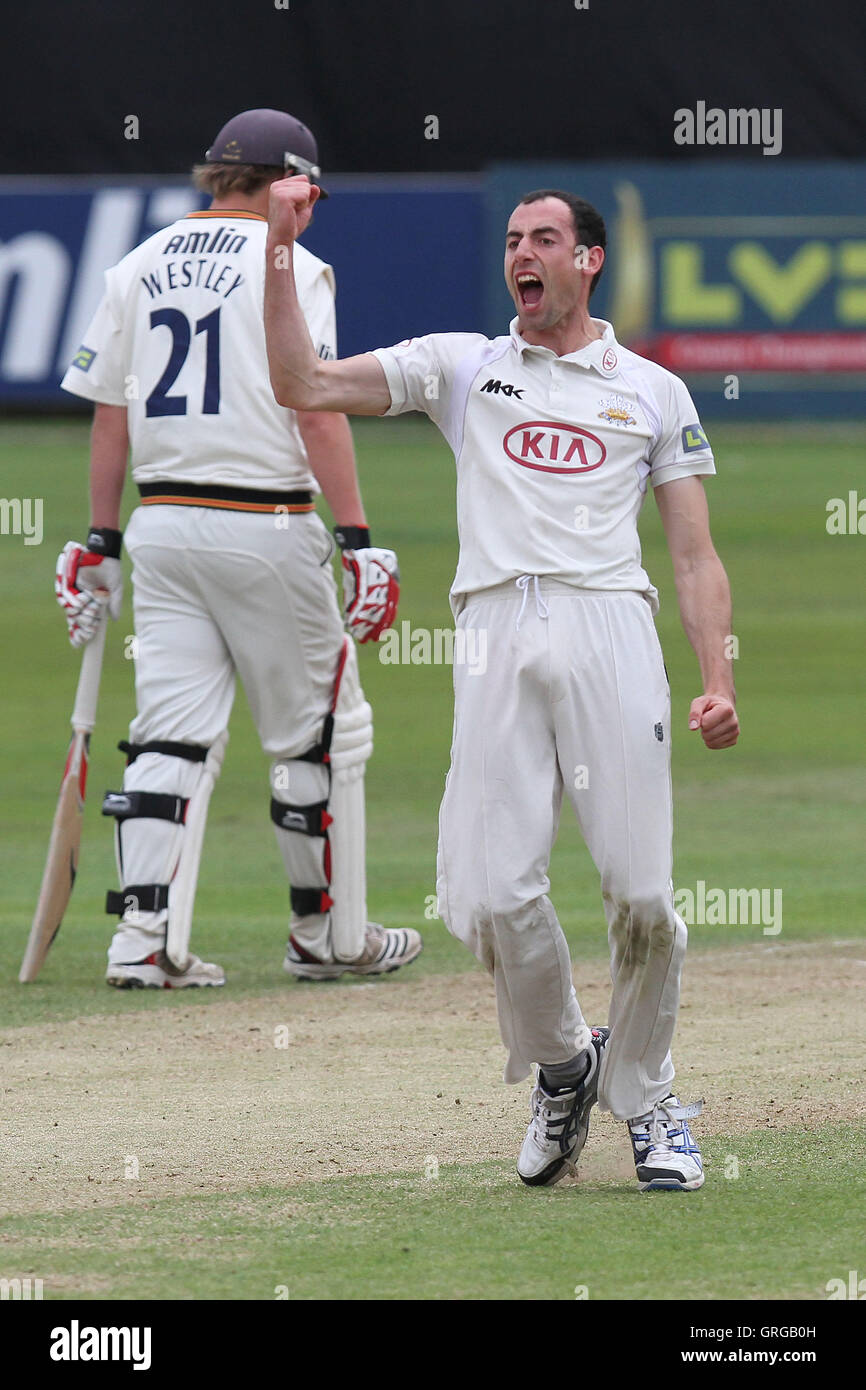 Tim Linley of Surrey claims the wicket of Jaik Mickleburgh - Essex CCC ...