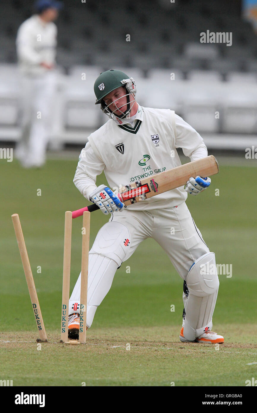 Alex Kervezee of Worcestershire looks back to his broken stumps after ...