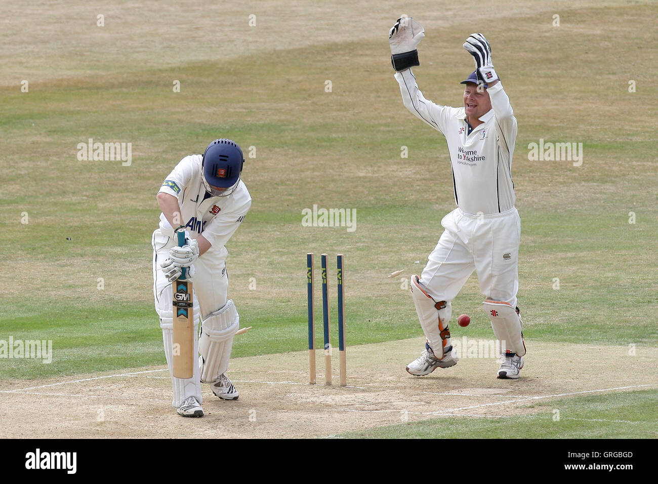Gerard Brophy is the first to celebrate as Essex batsman Tim Phillips ...
