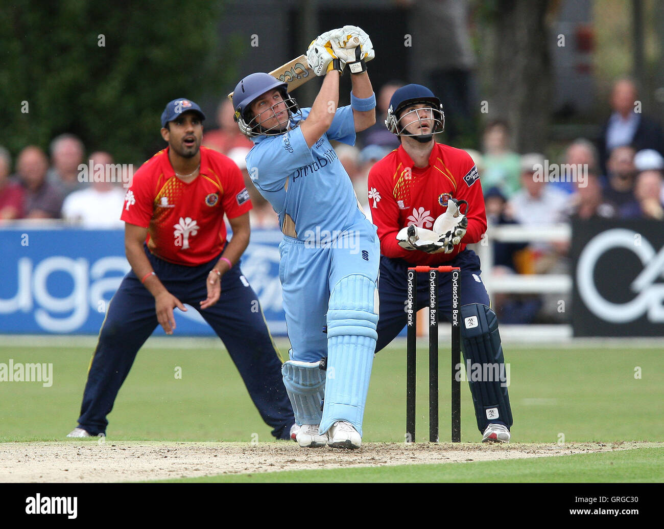 James Foster (R) and Ravi Bopara can only watch as Wes Durston scores ...
