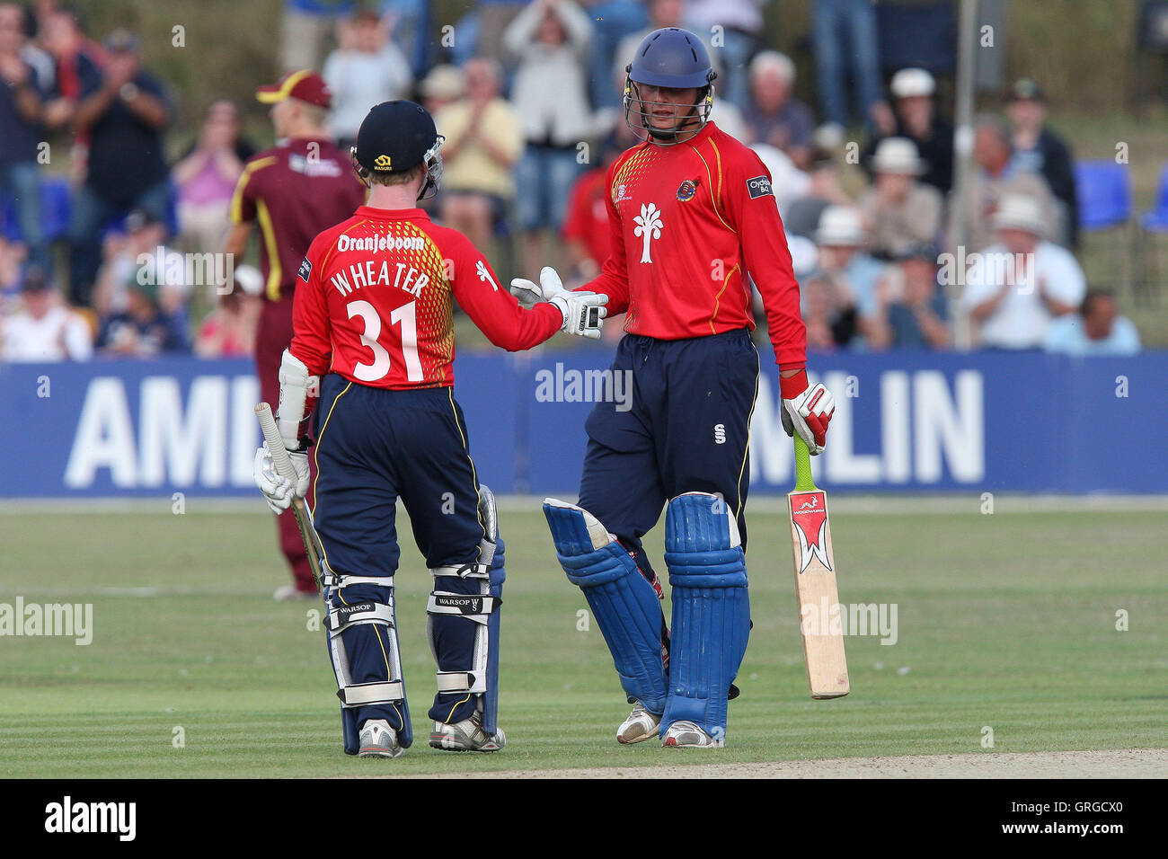 Adam Wheater (L) and Michael Comber both score half centuries as they ...