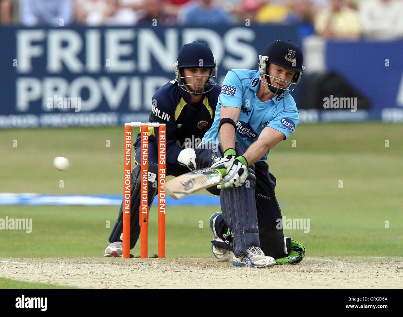 Ed Joyce in batting action for Sussex as James Foster looks on - Essex ...