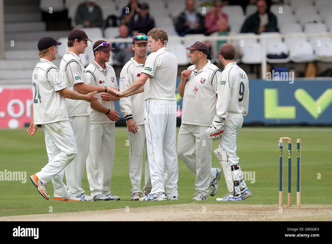 David Balcombe of Kent (3rd R) is congratulated on the wicket of Jaik ...