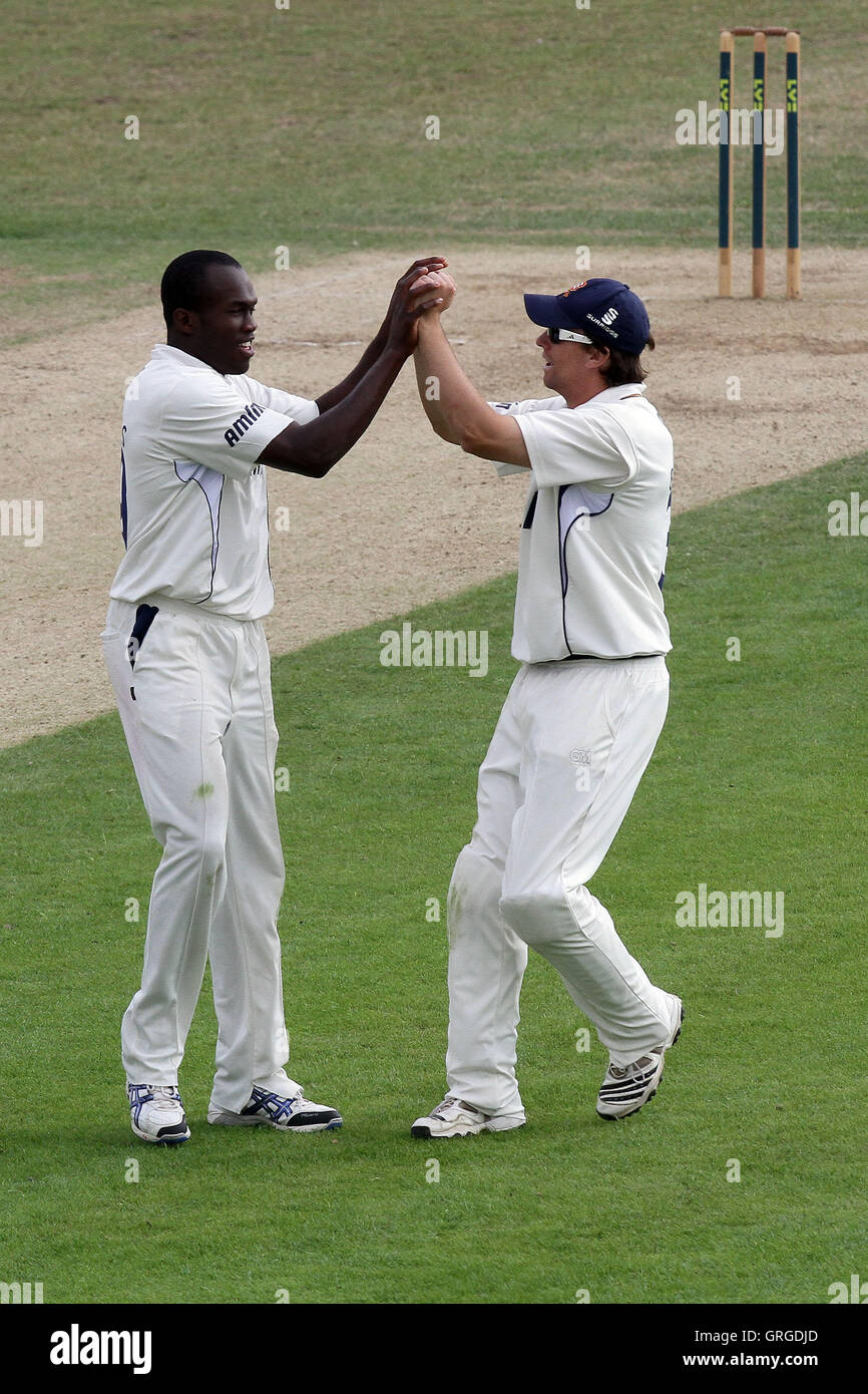 Maurice Chambers of Essex celebrates the wicket of Greg Smith ...
