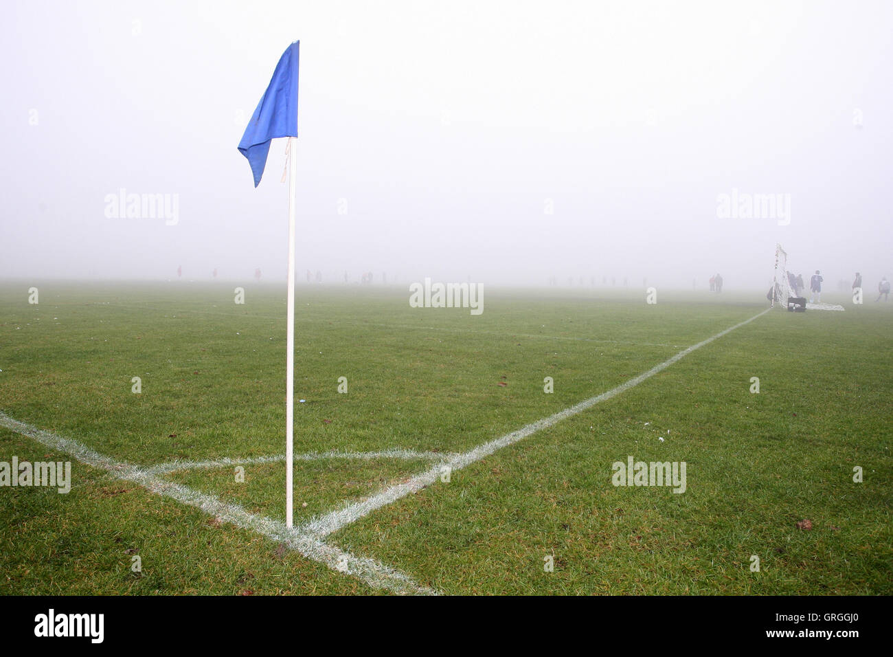 A corner flag is seen in fog before an East London Sunday League match ...