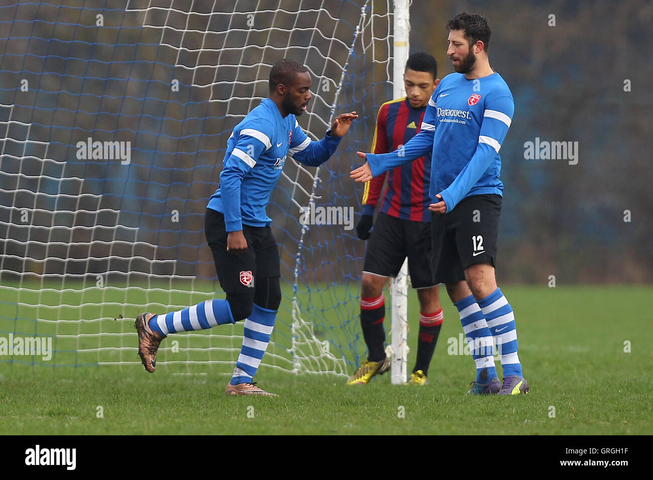 Highfield celebrate their first goal - Highfield (blue) vs FC Bartlett ...