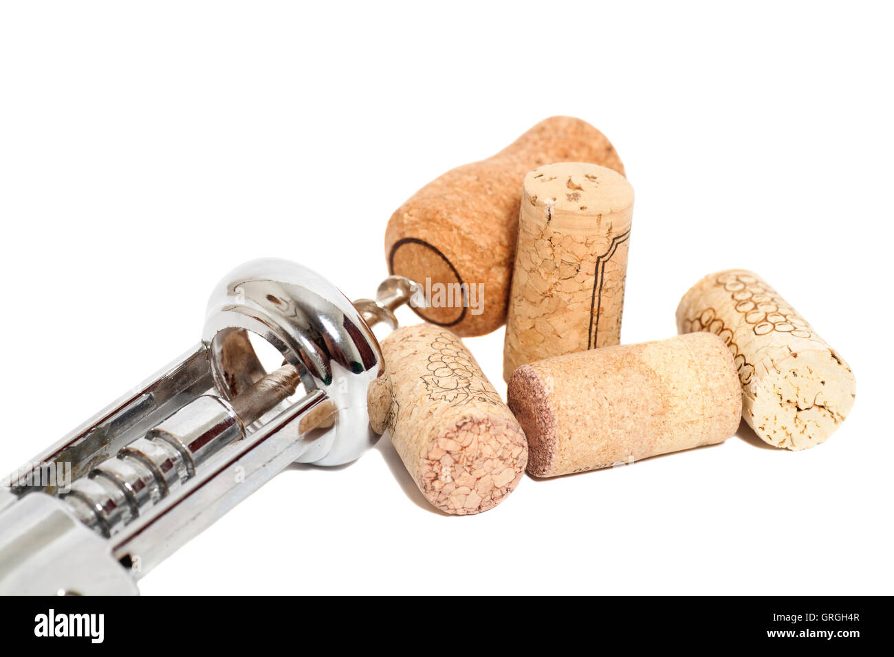 Corkscrew for wine and corks isolated on a white background Stock Photo ...