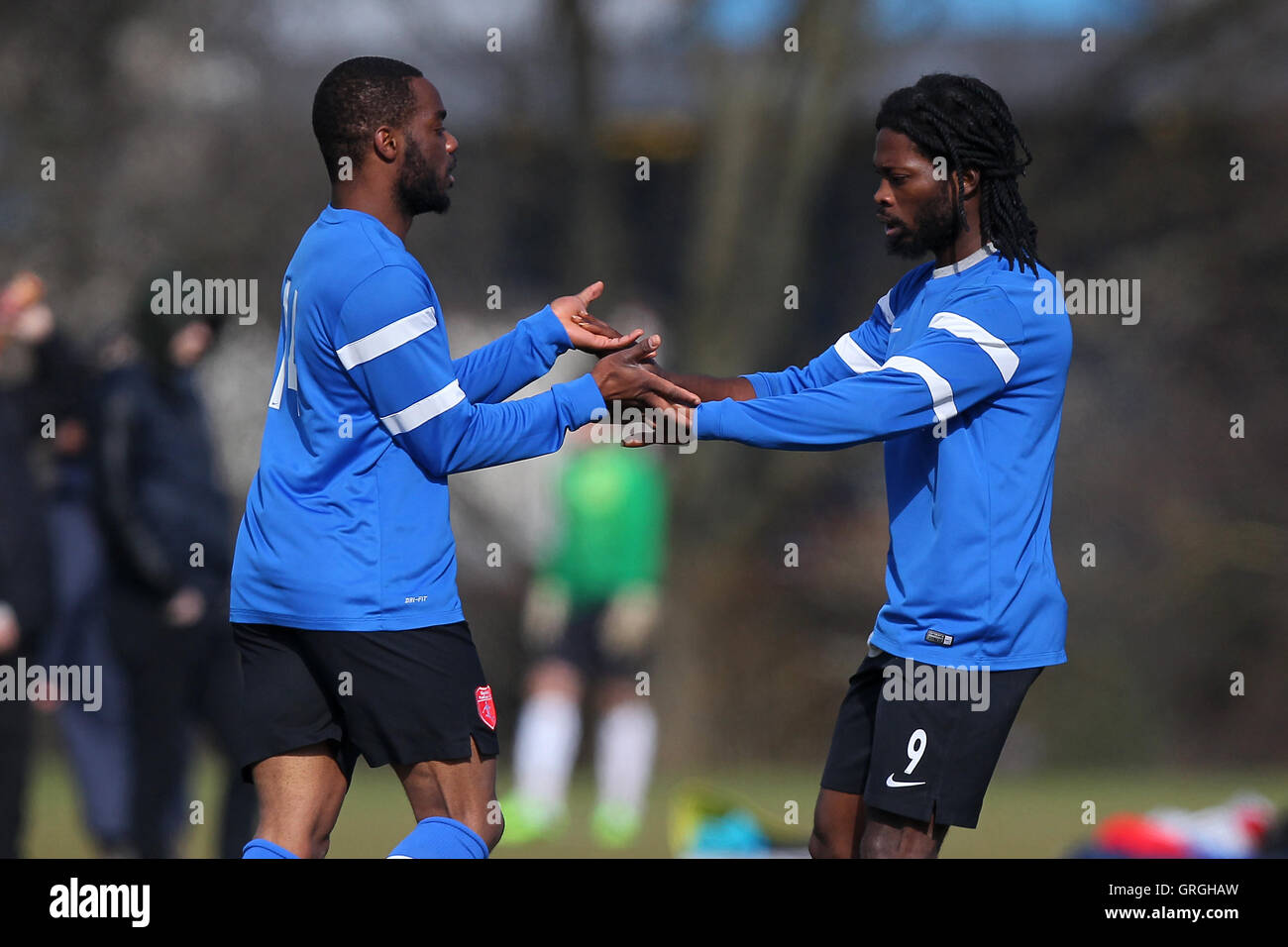 Highfield score their second goal and celebrate - Highfield (blue) vs ...