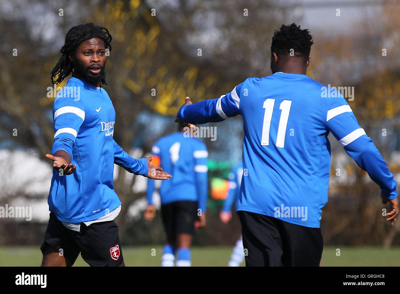 Highfield score their third goal and celebrate - Highfield (blue) vs ...