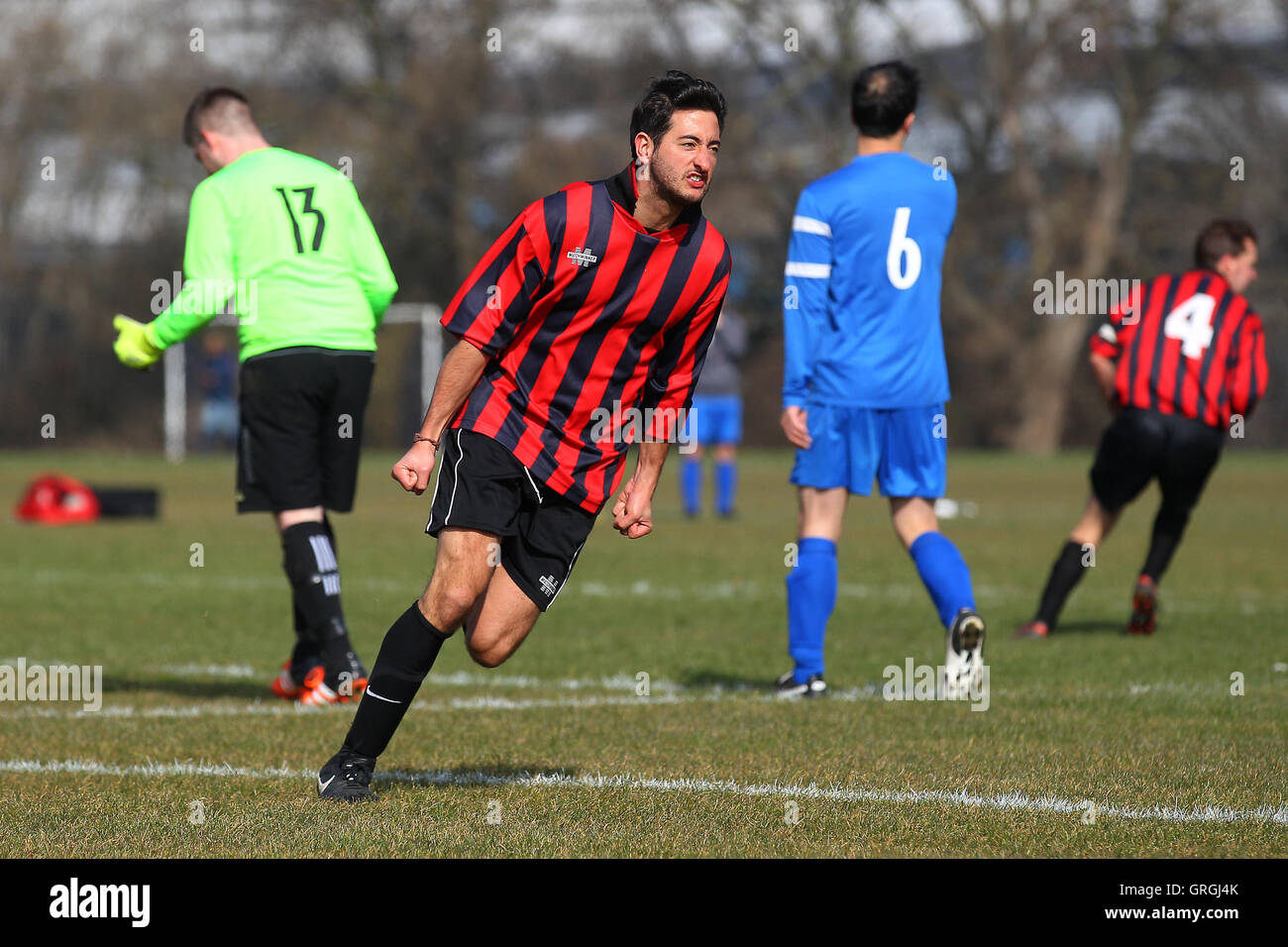 South London celebrate their first goal - Gladstone Wanderers (blue) vs ...