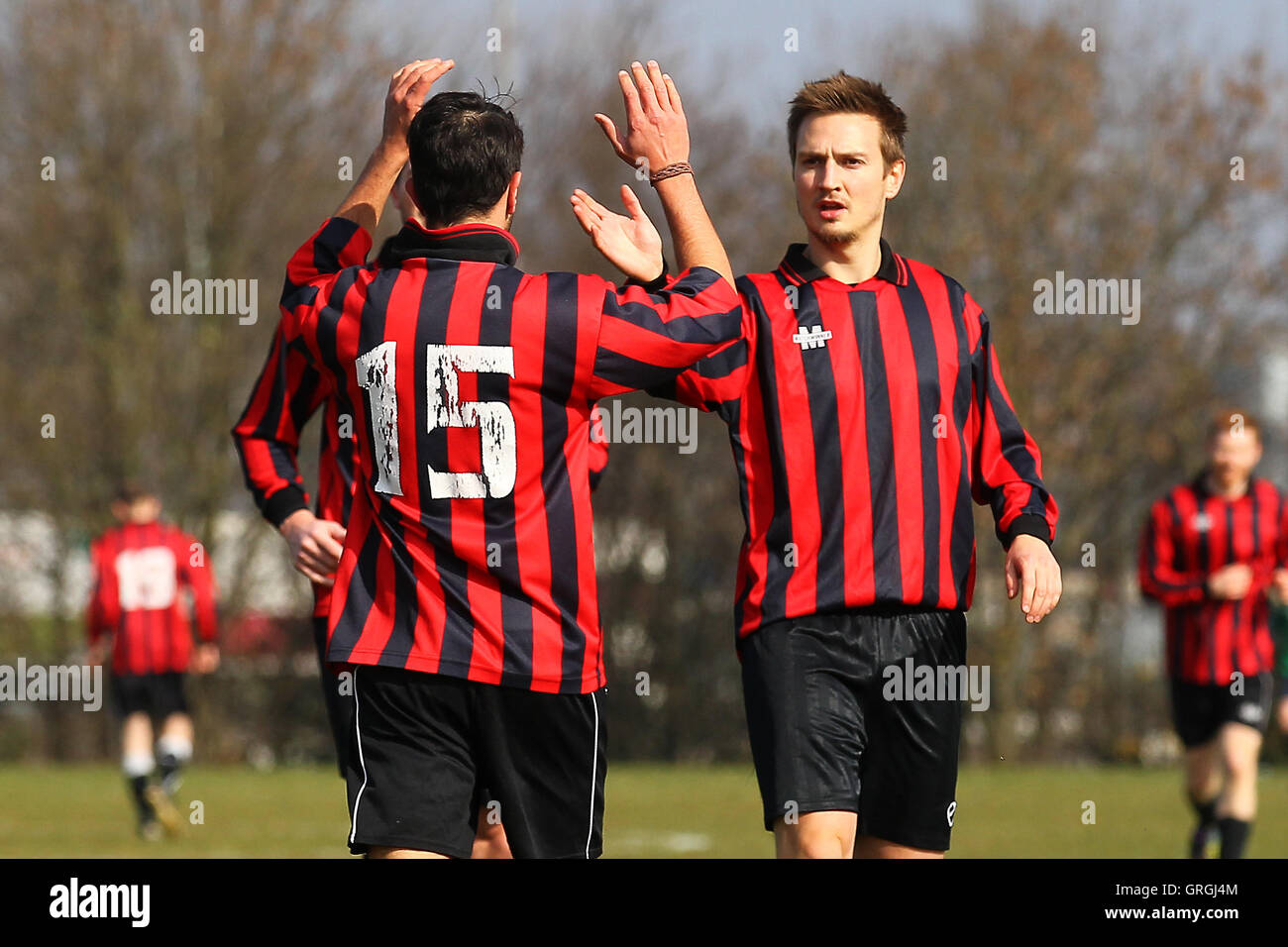 South London celebrate their first goal - Gladstone Wanderers (blue) vs ...