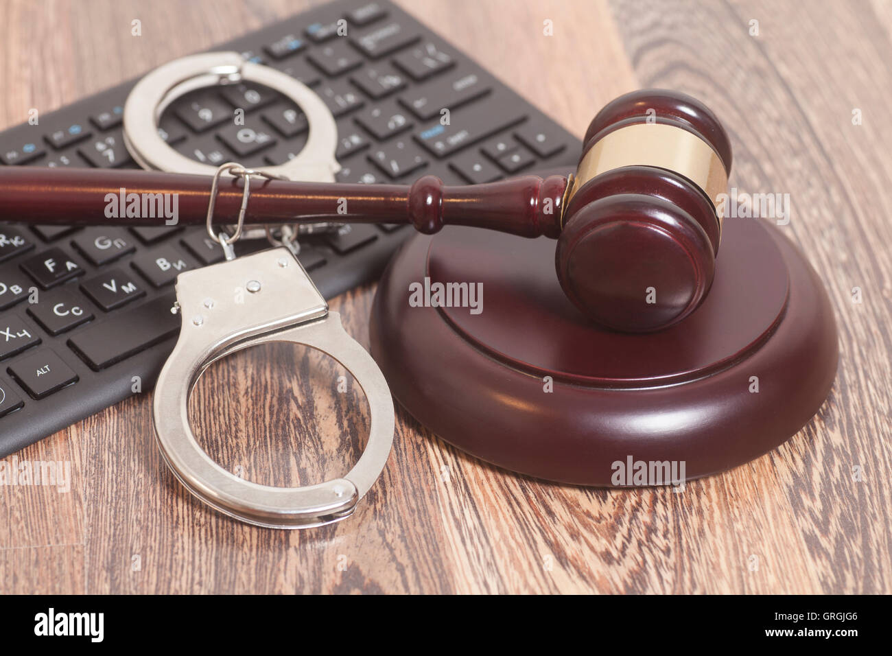 Modern handcuffs hi-res stock photography and images - Alamy