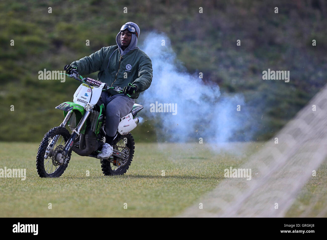 A motorcyclist passes the pitch - Highfield (blue) vs Shakespeare ...