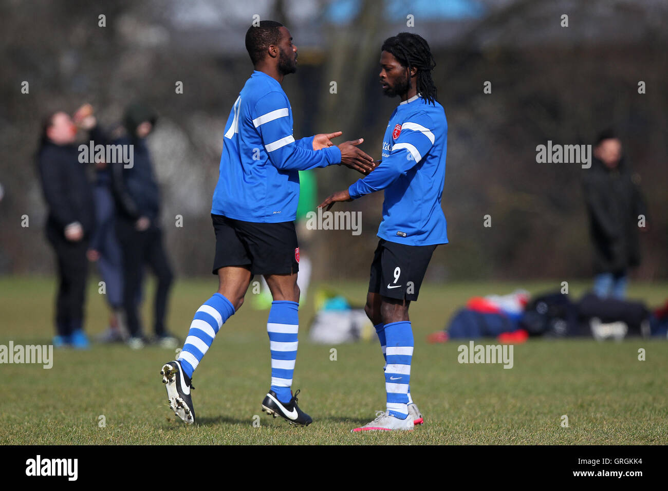 Highfield score their second goal and celebrate - Highfield (blue) vs ...