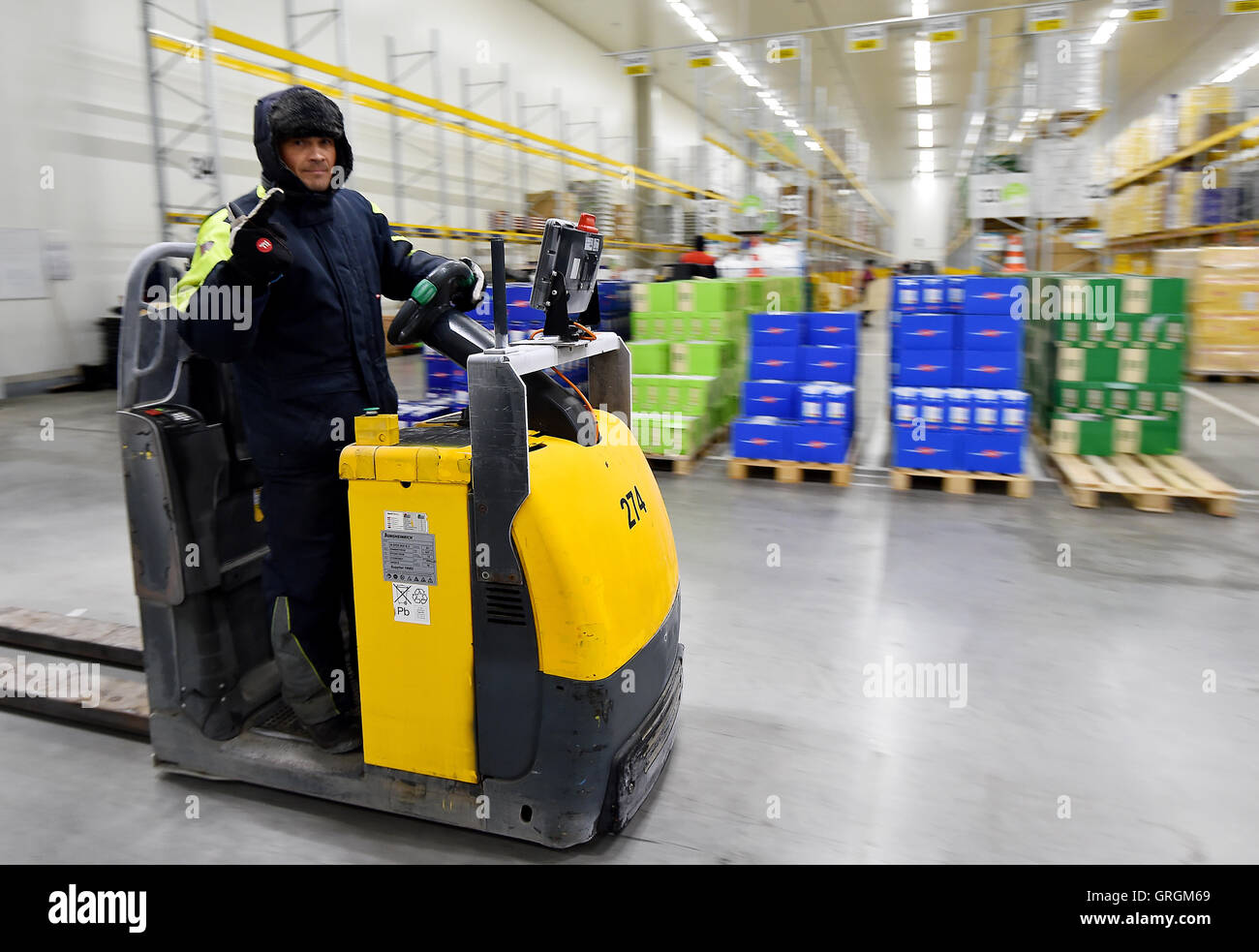 A forklift driving through the Lidl logistics cneter in Grossbeeren ...