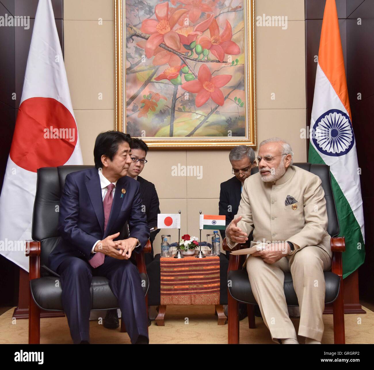 Indian Prime Minister Narendra Modi sits with Japanese Prime Minister ...