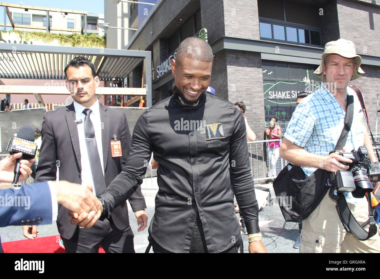 Hollywood, California, USA. 7th Sep, 2016. I15848CHW.USHER Honored With ...