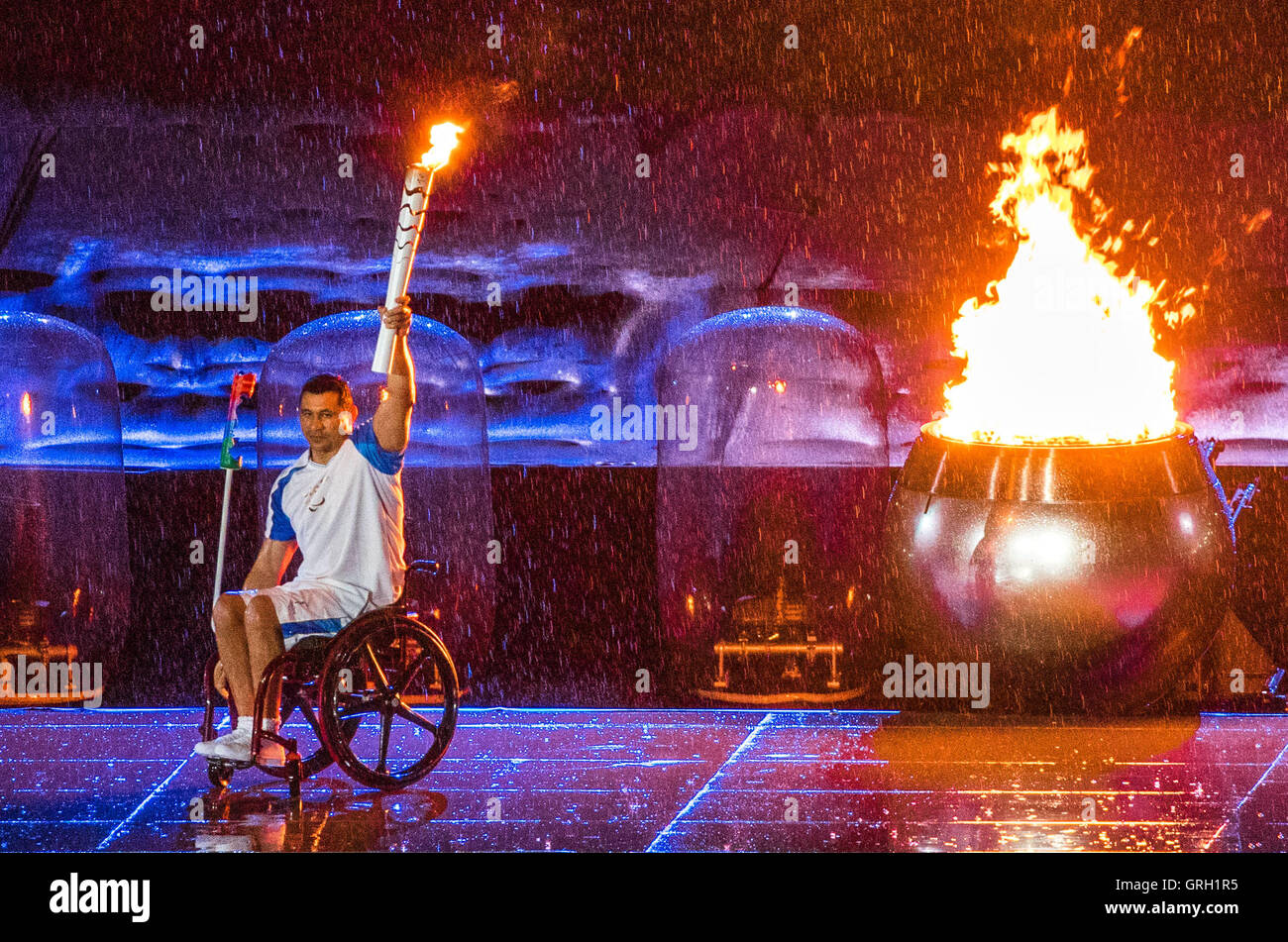 Clodoaldo Silva lights the cauldron during the Opening Ceremony of the ...