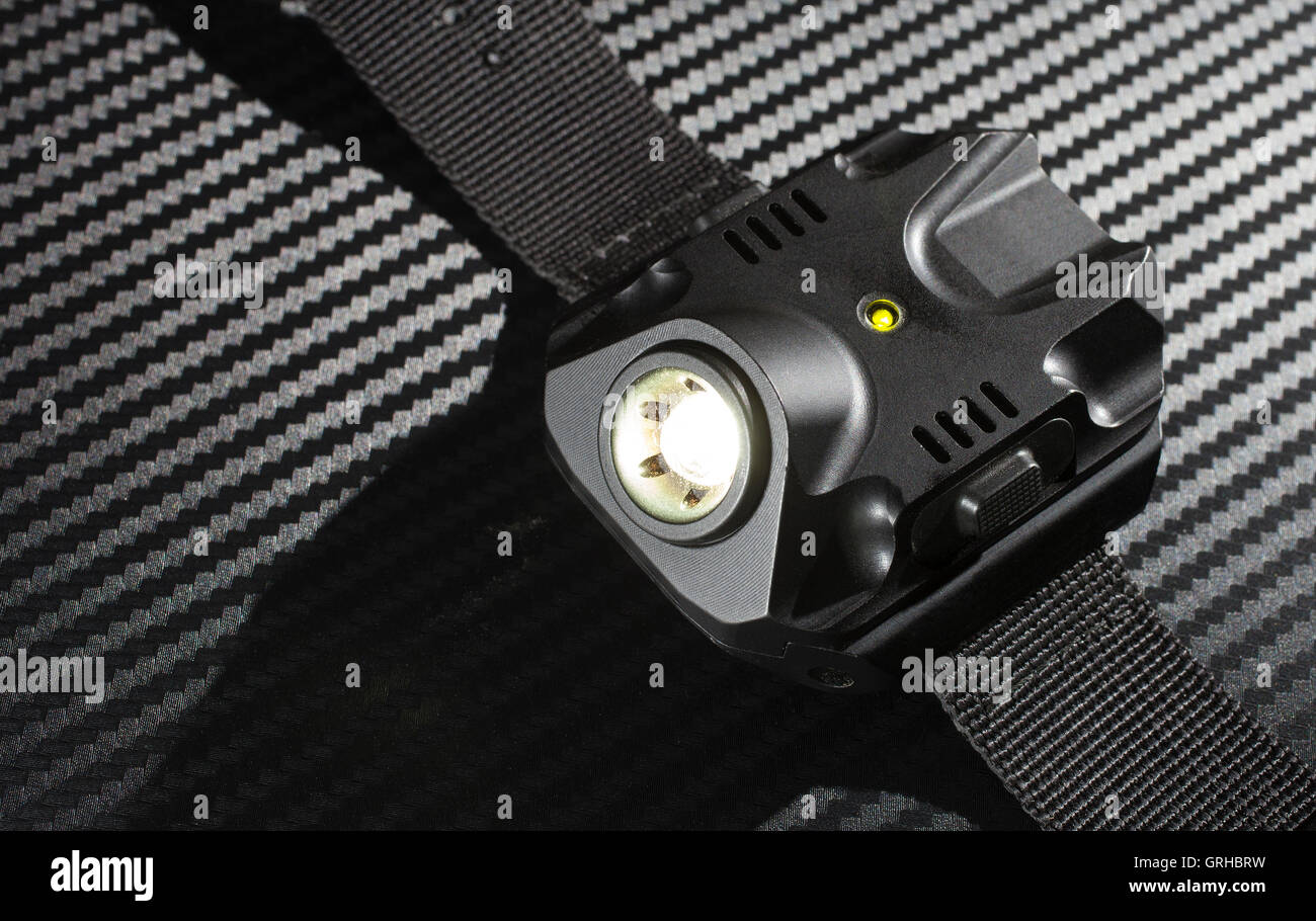 Tactical flashlight worn on the wrist that is on Stock Photo - Alamy