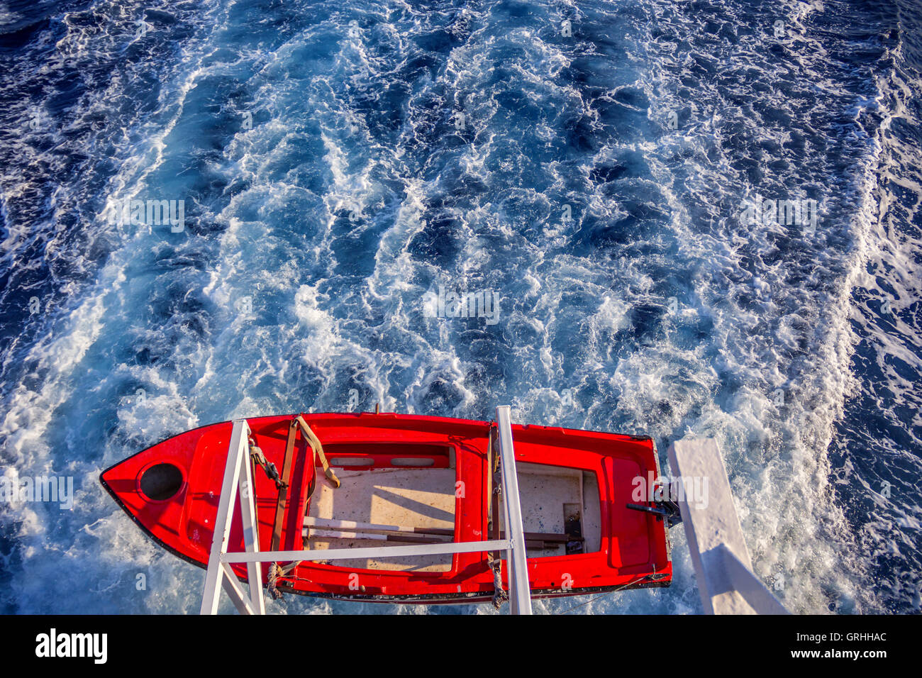 Lifeboat from the deck of a ship floating on the water Stock Photo - Alamy