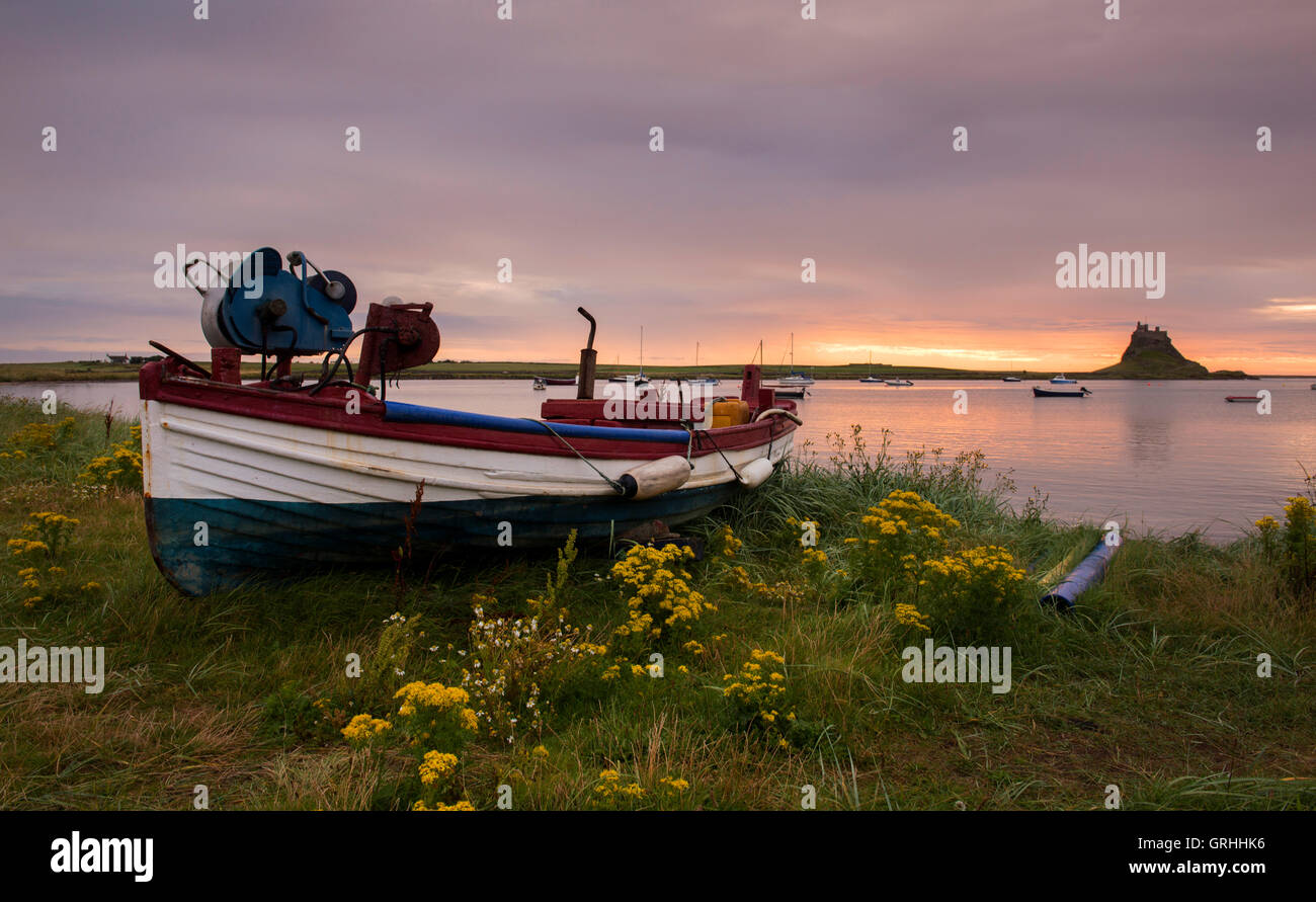 Sunrise on the beach at Lindisfarne, Holy Island Northumberland UK ...