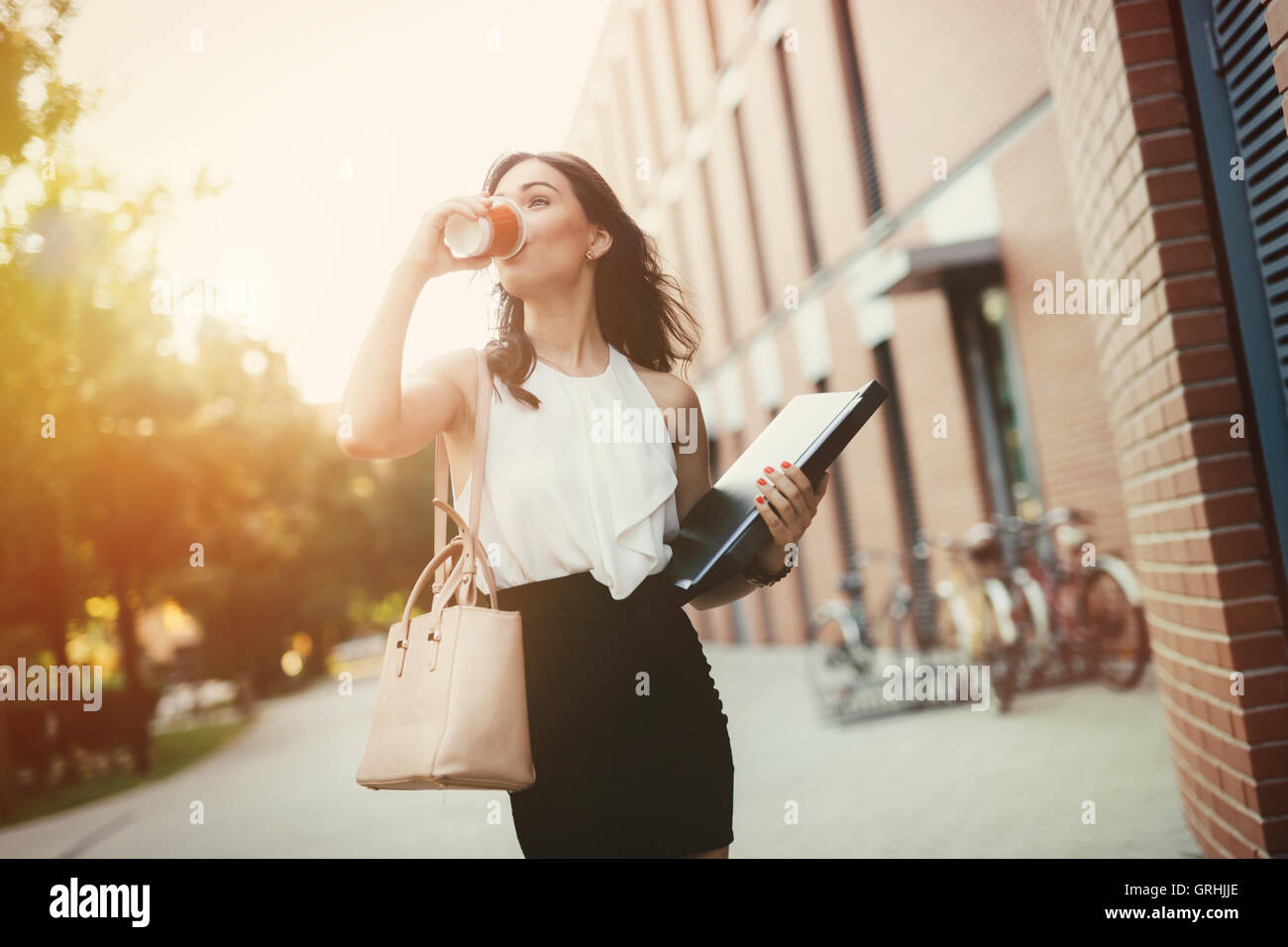 Businesswoman in a rush to work Stock Photo - Alamy