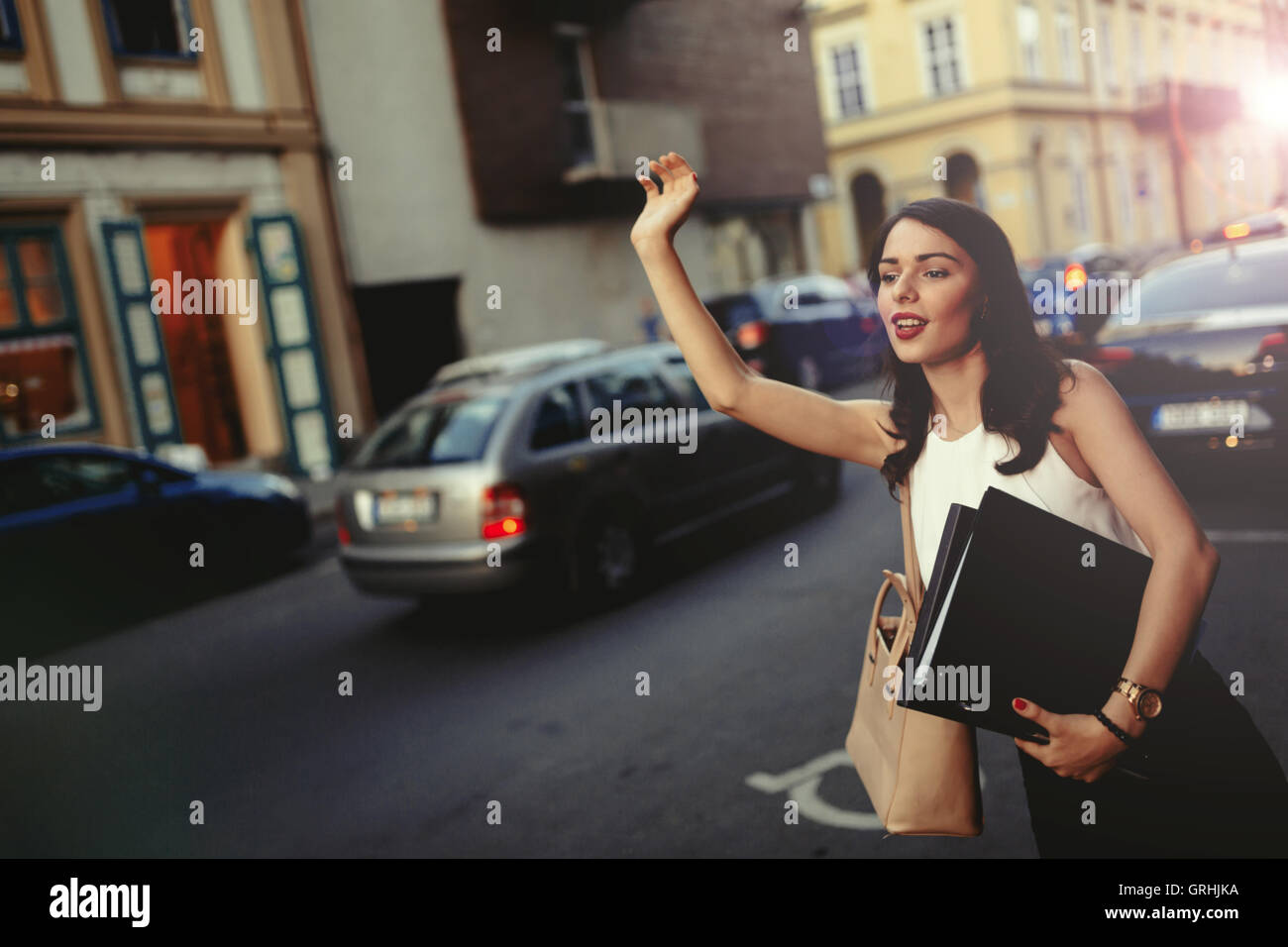 Catching a taxi hi-res stock photography and images - Alamy