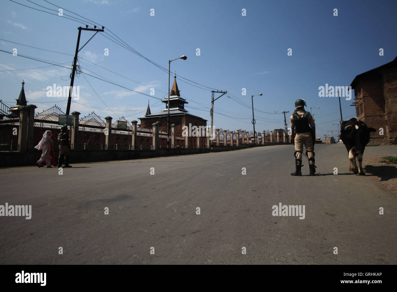 Srinagar, India. 07th Sep, 2016. Paramilitary troopers stand alert in ...