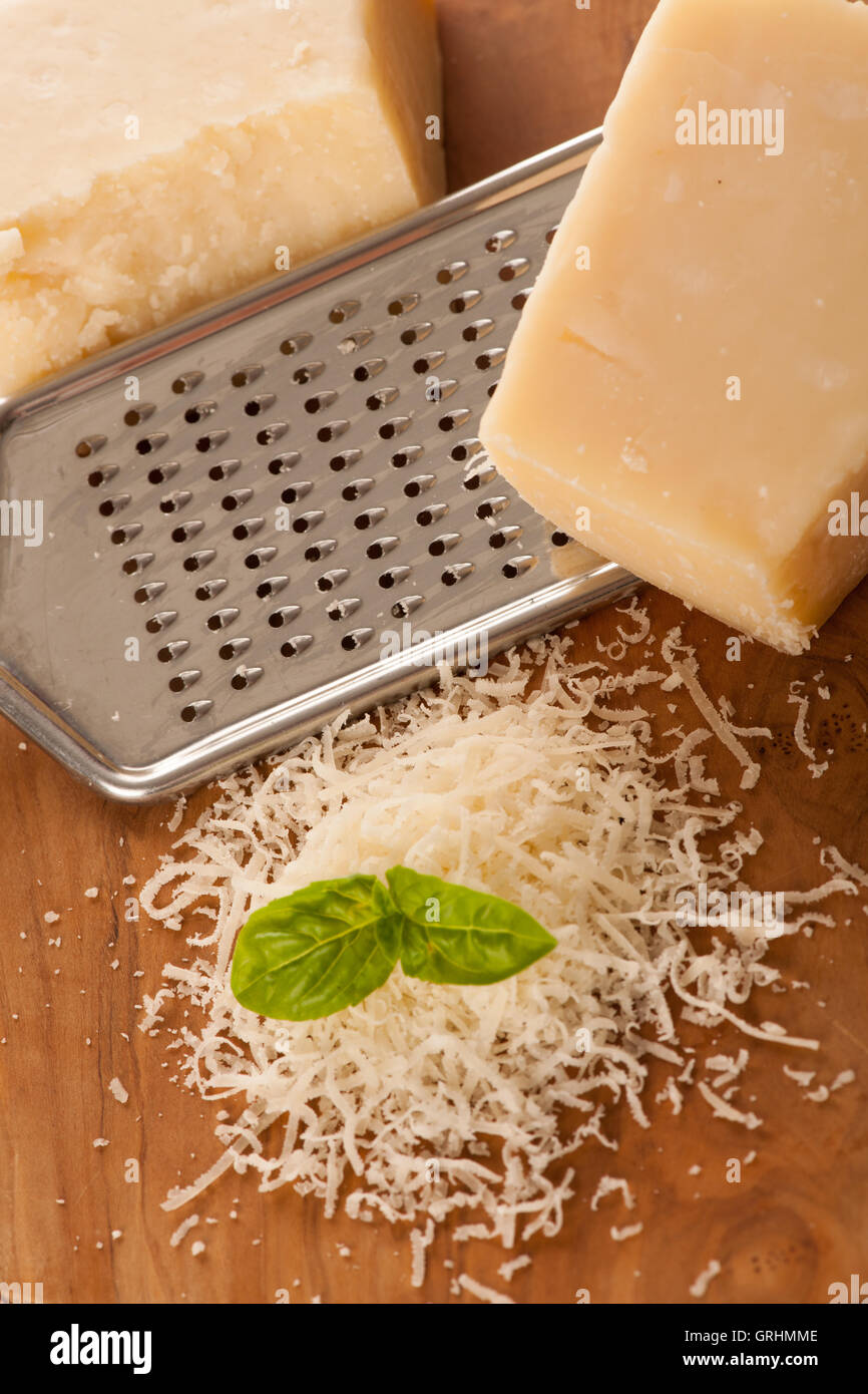 Parmesan cheese isolated over white background Stock Photo - Alamy