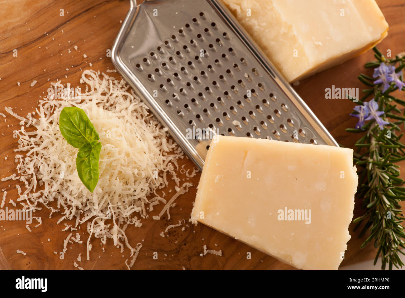 Parmesan cheese isolated over white background Stock Photo - Alamy