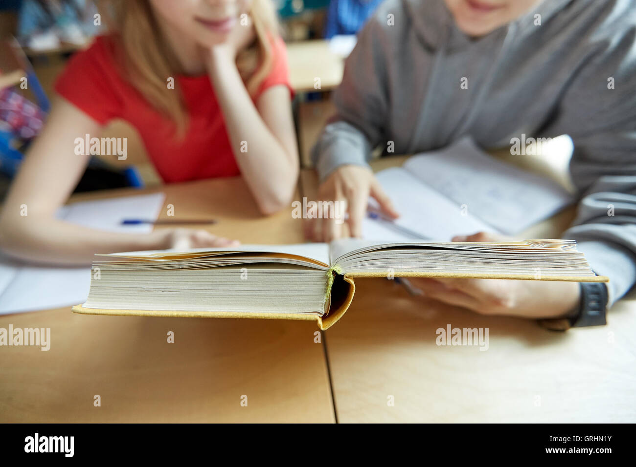 high school students reading book and learning Stock Photo - Alamy