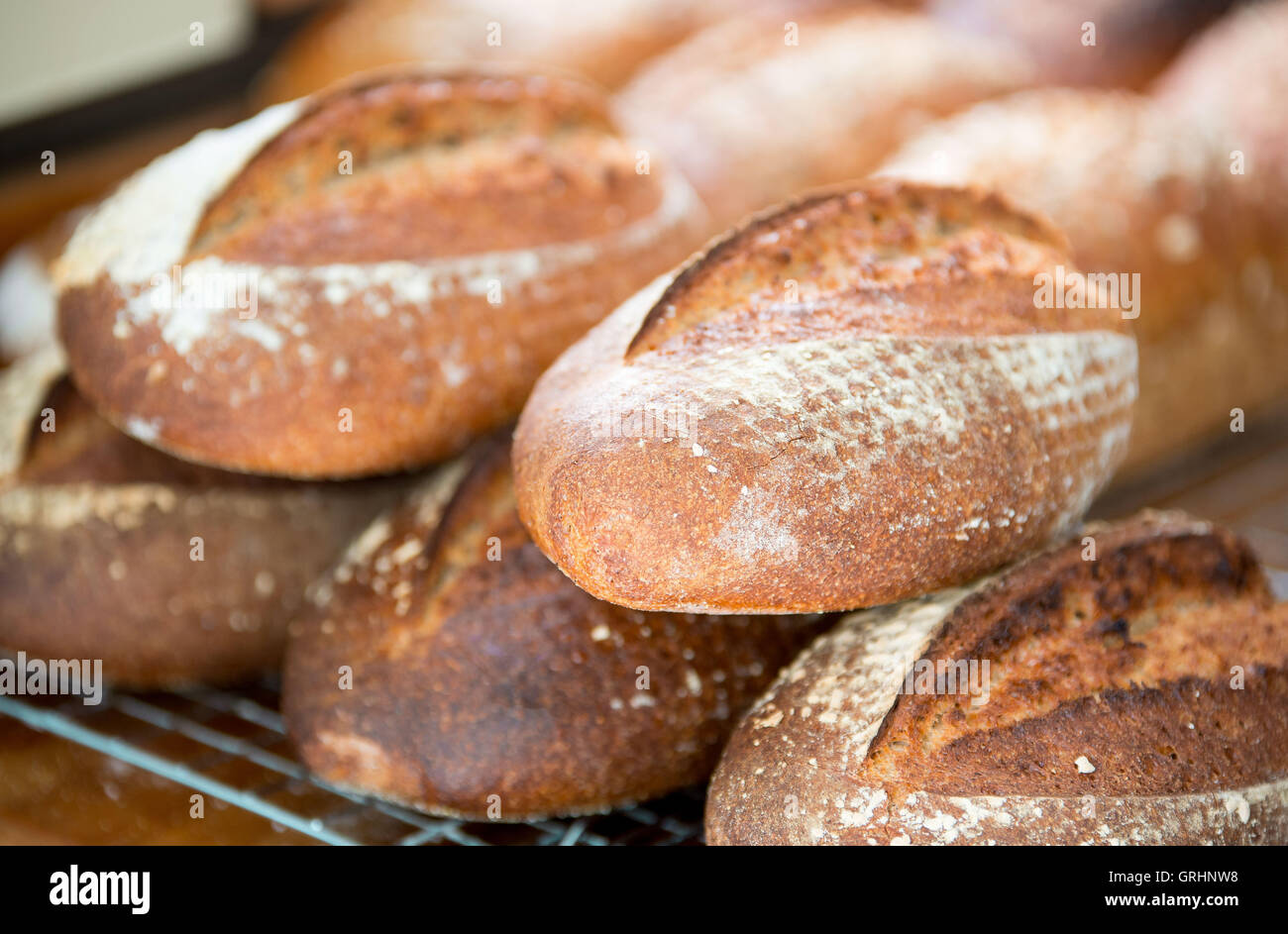 Baker baking loaves of bread hi-res stock photography and images - Alamy
